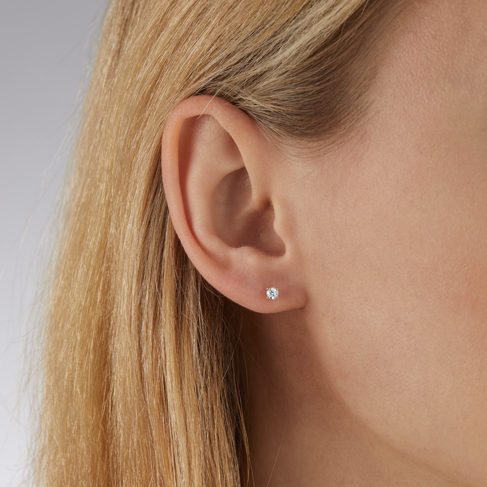 Goldsmiths 18ct Yellow Gold 0.25cttw Diamond 4 Claw Stud Earrings PE05389/18Y | Goldsmiths